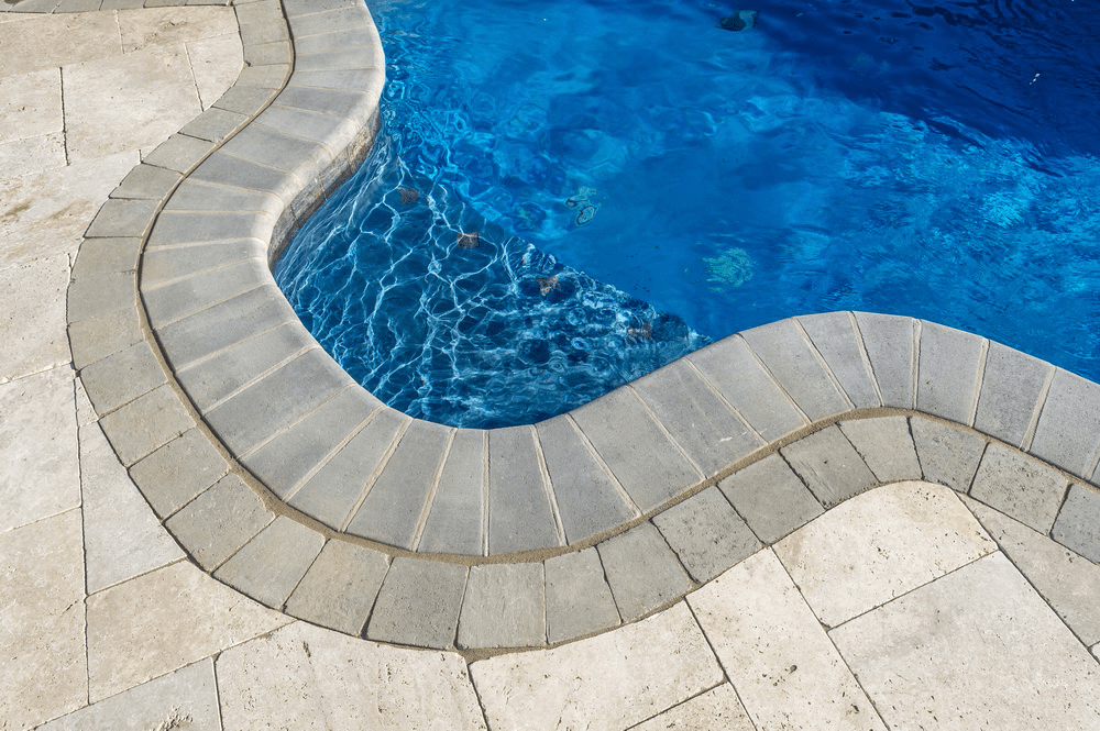 travertine-w-paver-coping – Gasper Landscape Design & Construction